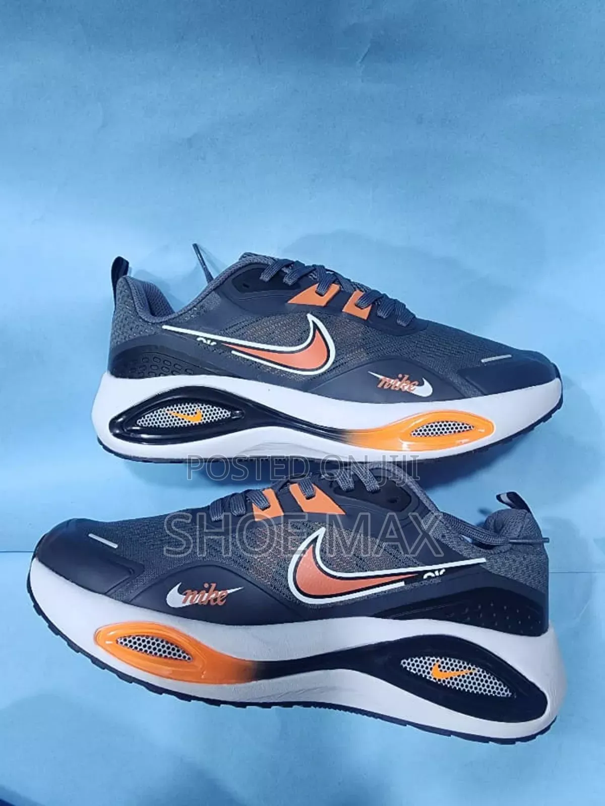 Nike Running Shoes in a Dark Grey Color, Orange Swash in Central ...