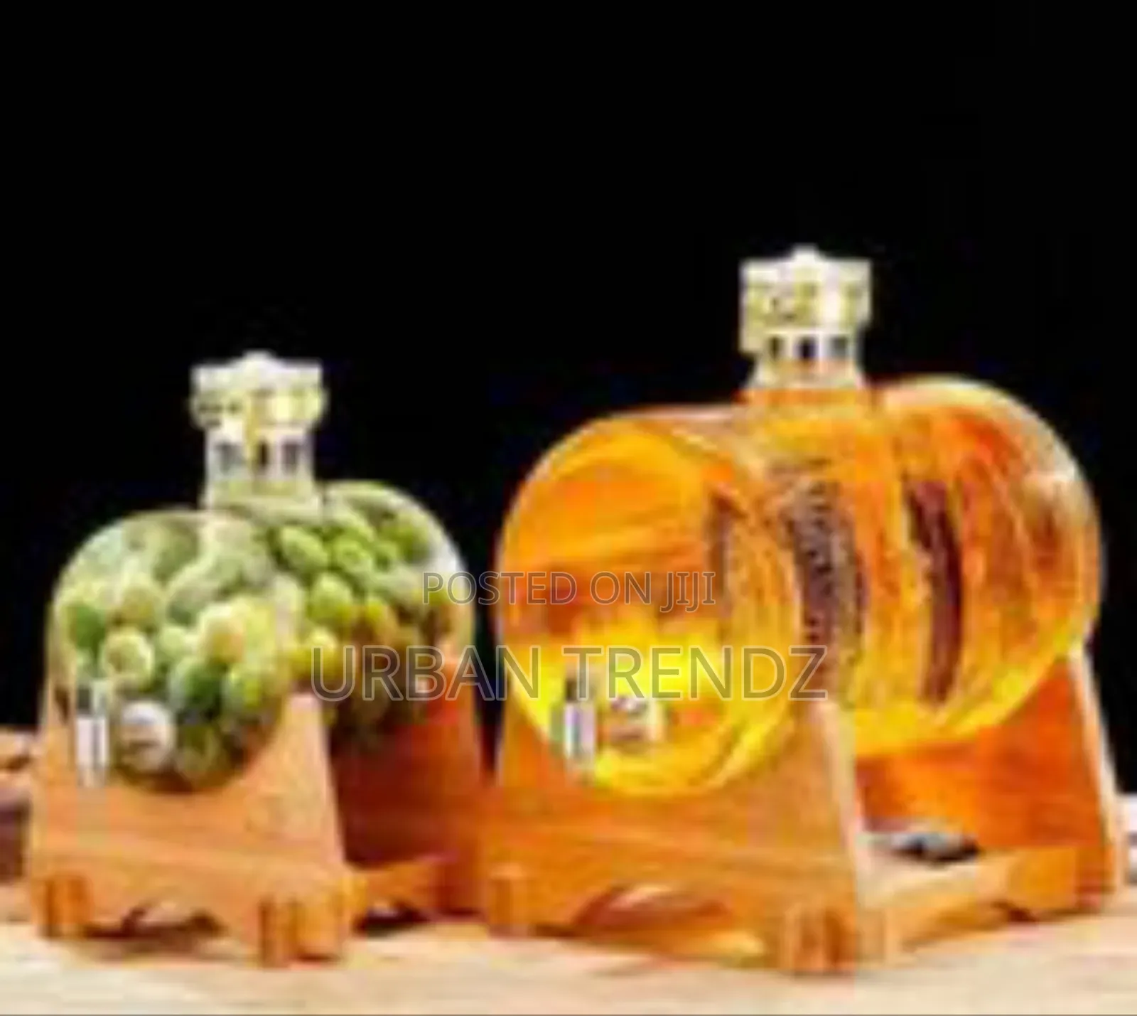 Glass Barrel-Shaped Beverage Dispenser With a Tap in Central Division ...