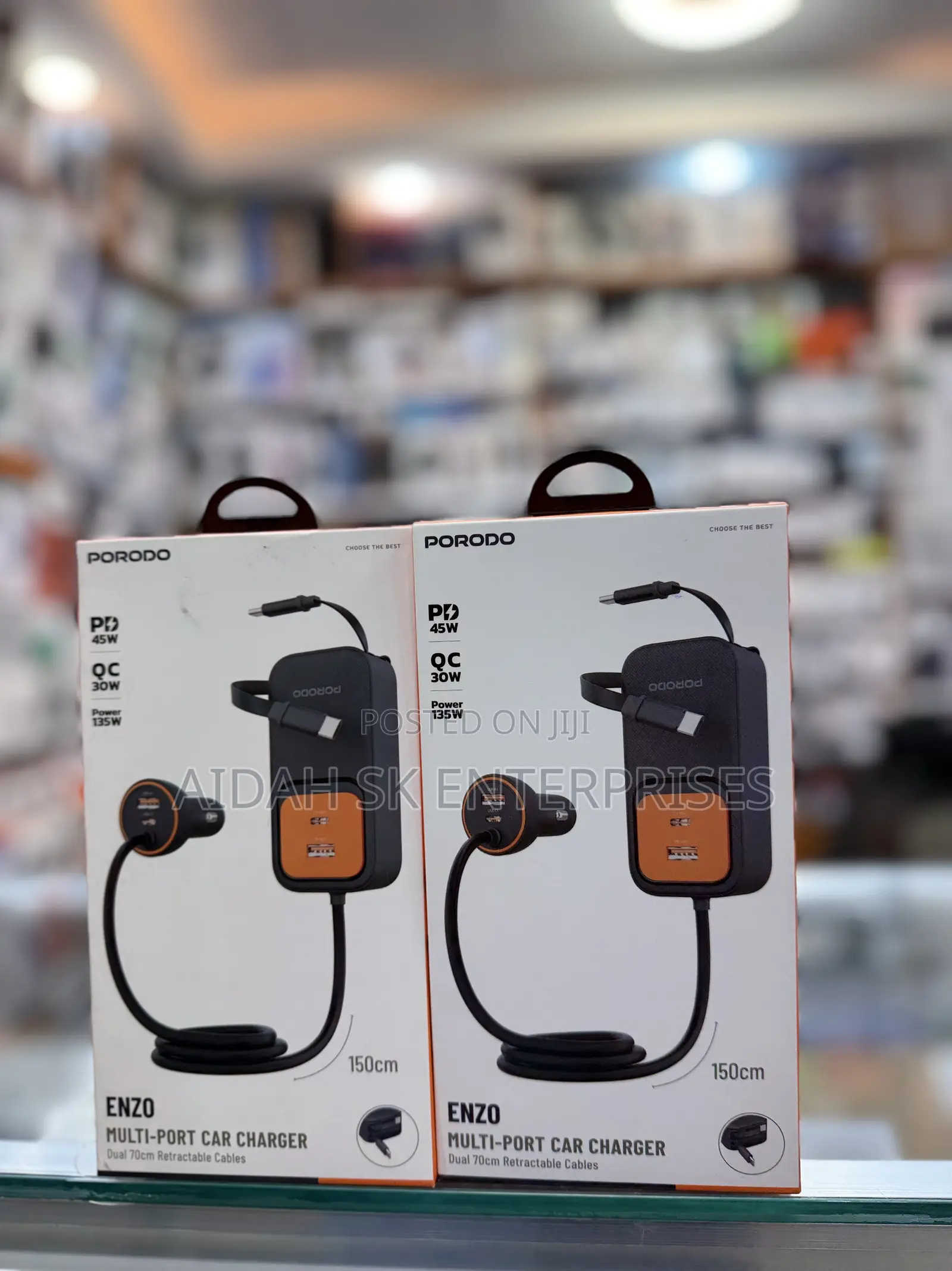 Porodo Enzo Multi-Port Car Charger With a 150cm Retractable Cable. for ...